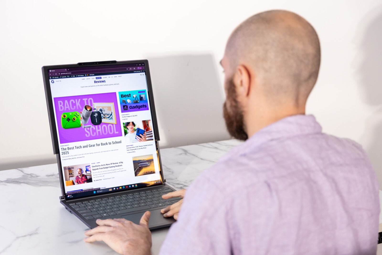 Screw Foldables: Lenovo's Rollable Laptop Proves There Are Better Uses ...